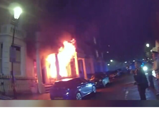 Heart-Stopping Video Shows Cops Rescuing People Trapped Inside Burning ...