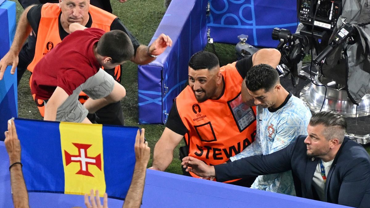 WATCH: Portugal's Cristiano Ronaldo Narrowly Avoids Fan Who Jumped from ...