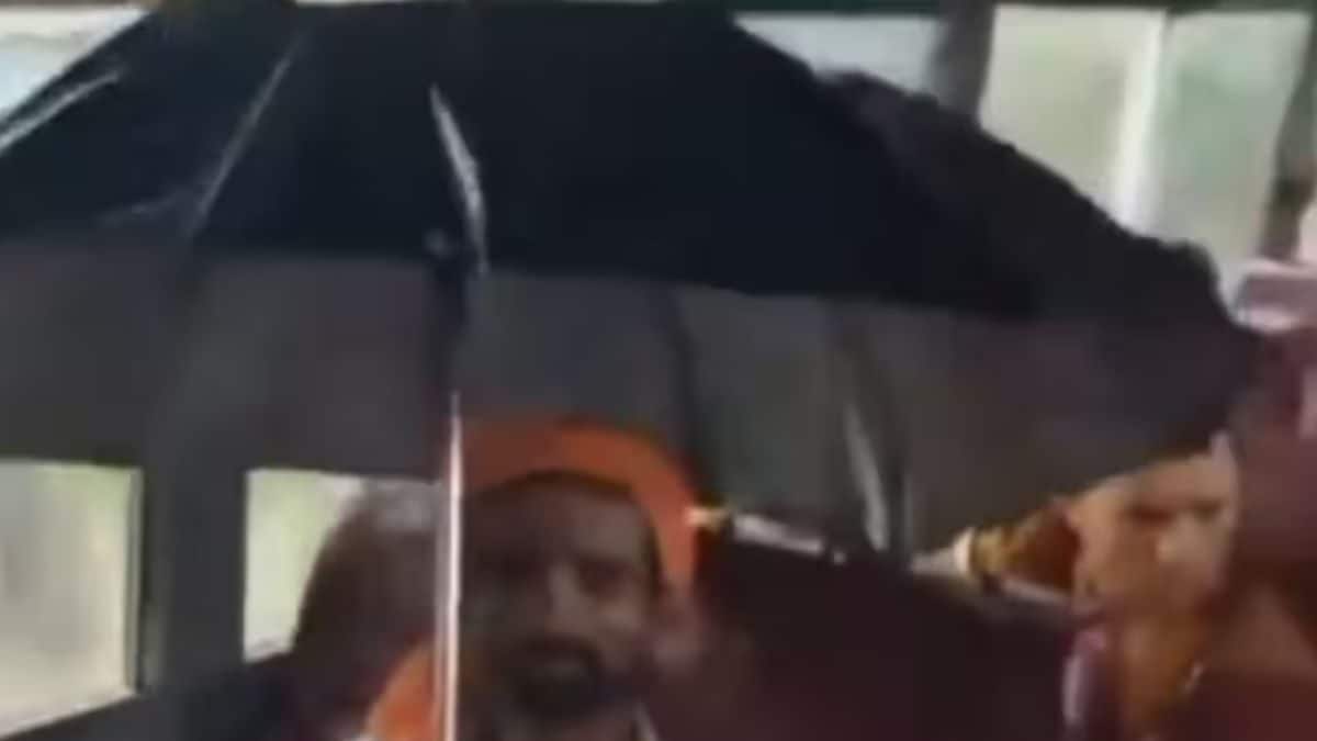 Watch: Passenger Sits With Umbrella Inside Bus Due To Leaky Roof ...