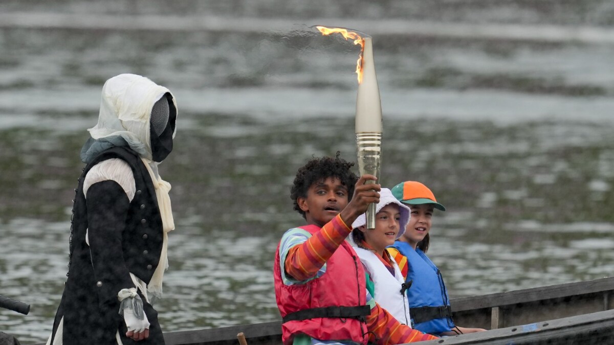 Who Was Mysterious Torchbearer At Paris Olympics Opening Ceremony ...
