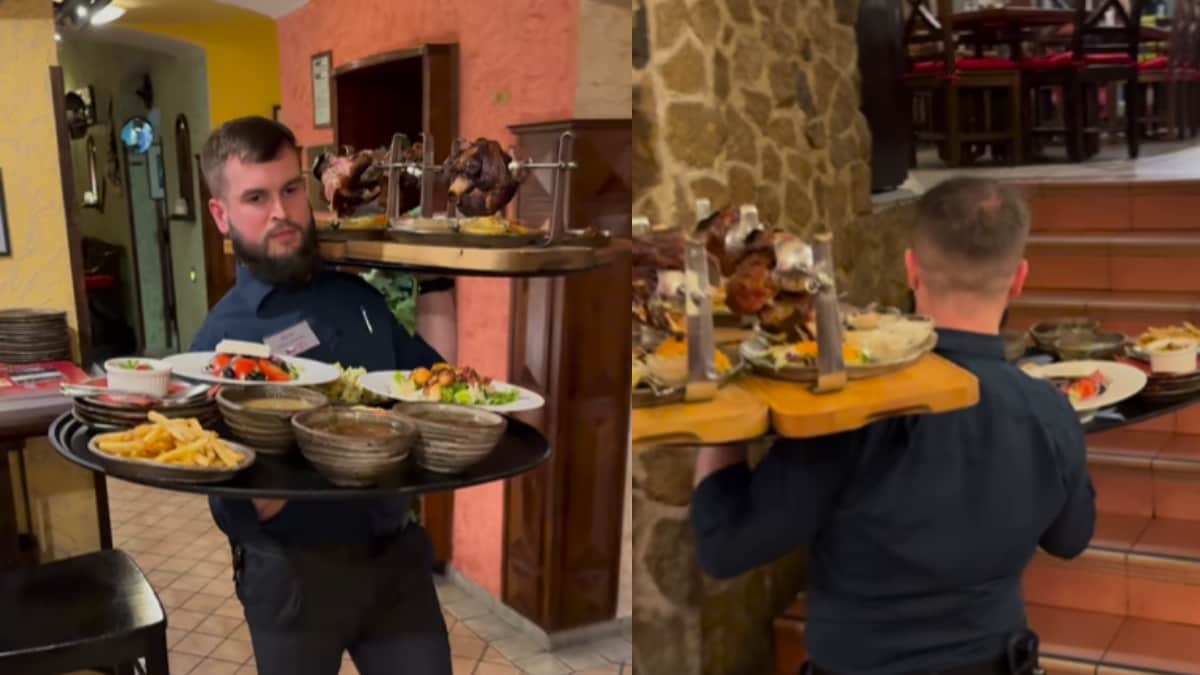 This Waiter Carrying Heavy Load Of Food Might Give You Second-Hand Arm ...