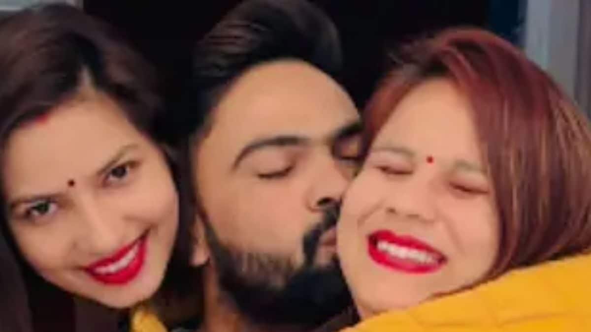 Bizarre Video Of Man’s Two Wives ‘Dividing’ Him Viral | Viral News - News18