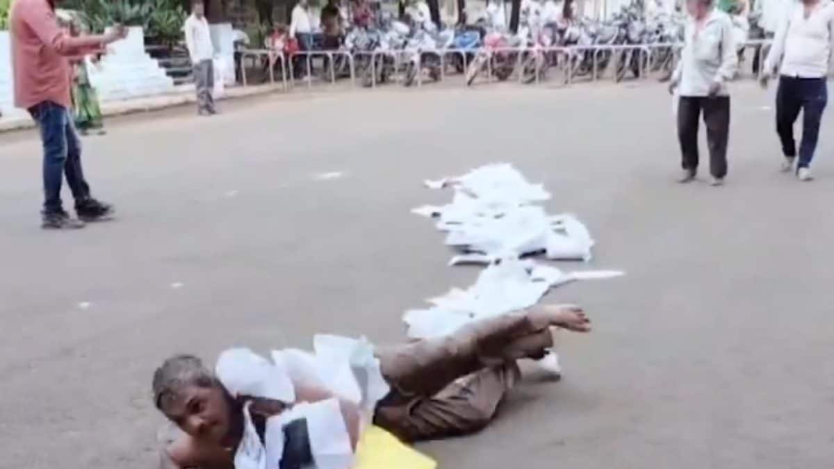 MP Man Rolls Outside Collector's Office With Garland Of Complaint Pages ...