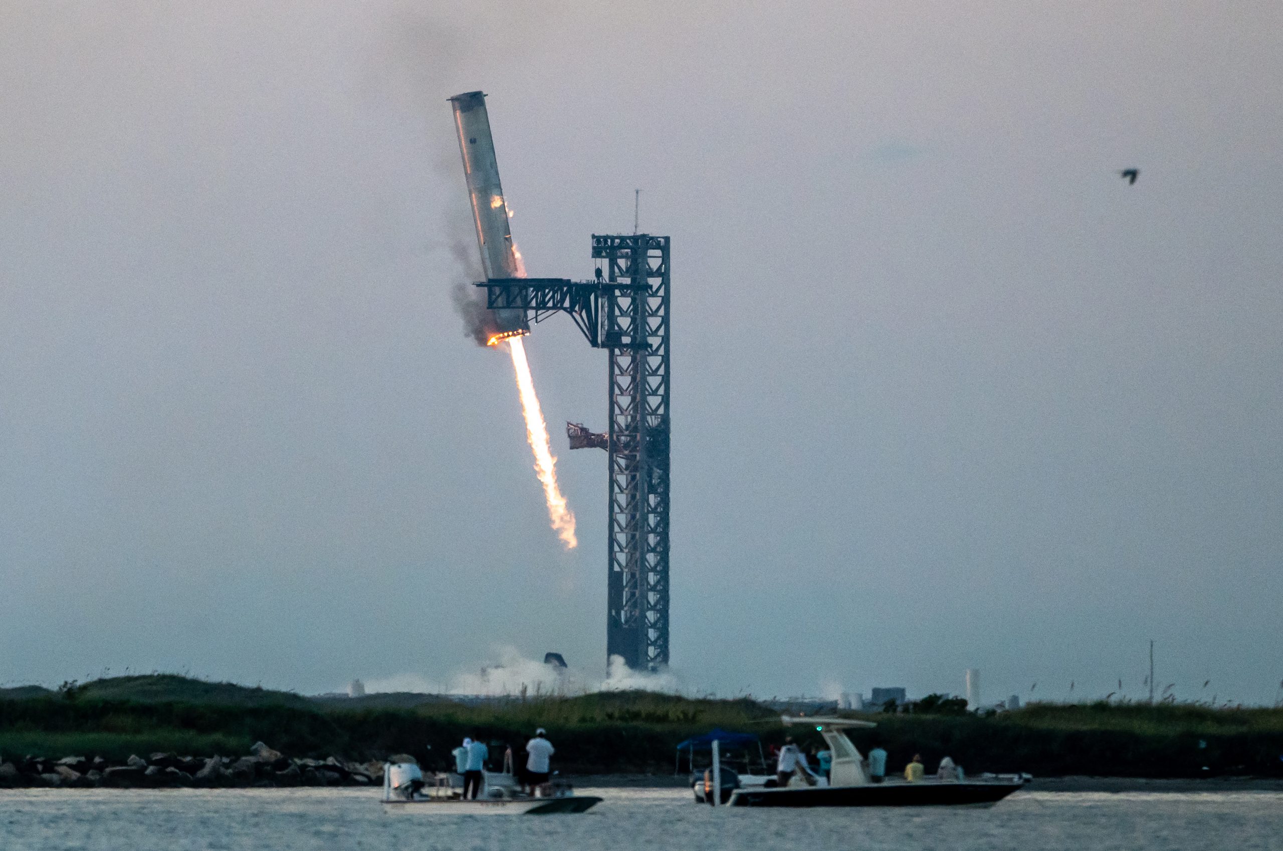SpaceX Makes History As Mechanical Arms Catch Giant Starship Booster ...