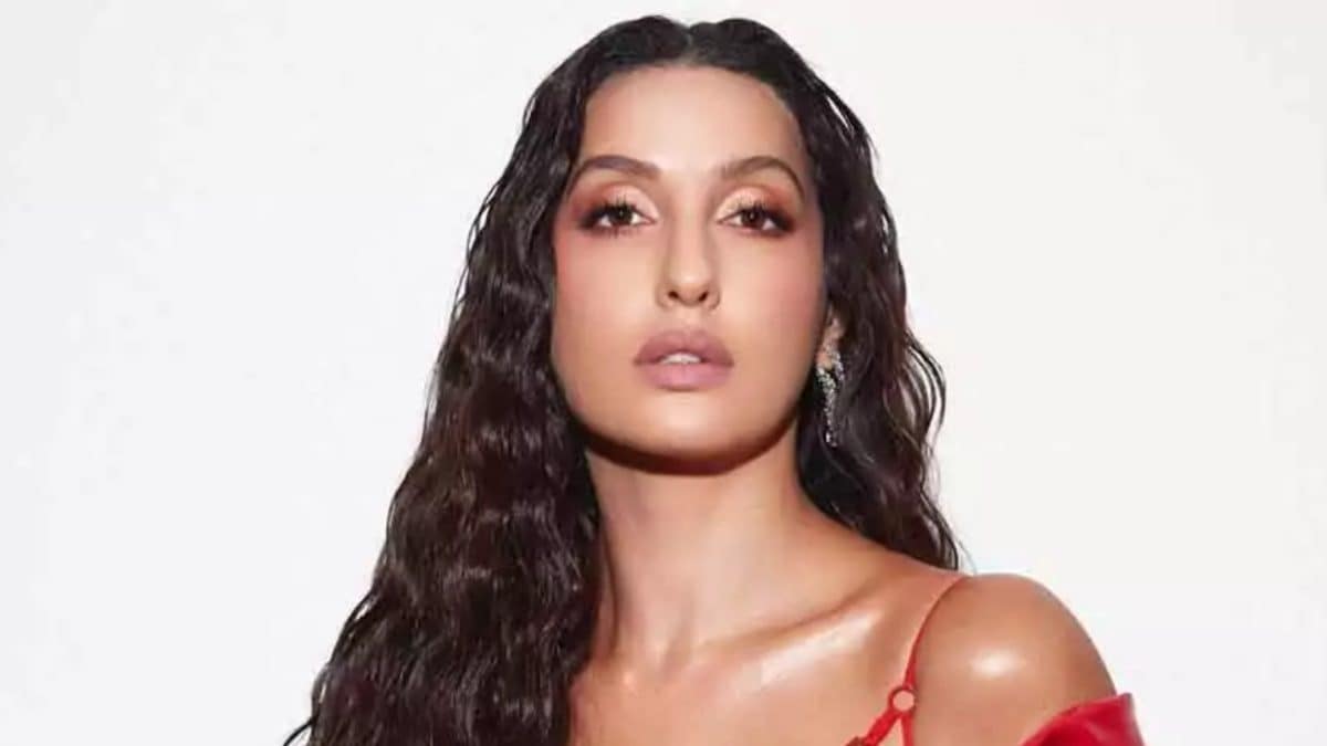 Nora Fatehi Sets The Stage On Fire In Red Saree And Sparkling Silver Co ...