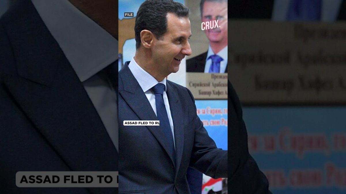 Syrians Tear Down Assad Poster, Topple Statue Outside Damascus Library