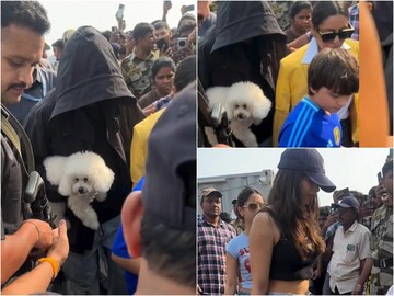 Shah Rukh Khan Holds Pet Dog, Hides Face In Hoodie As He Returns To ...