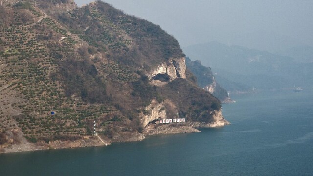 Mountain Shaped Like A Dog’s Head Turns Chinese Town Into Tourist ...