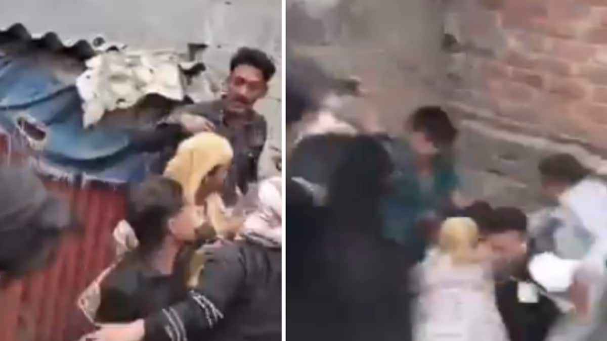 On Camera: Neighbours' Rooftop Brawl Takes A Shocking Turn | Viral News ...
