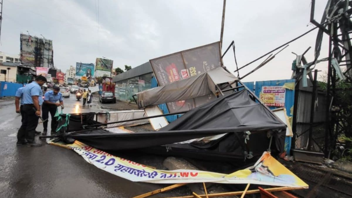Hoarding Collapses Amid Heavy Rain In Pune, Several Two-Wheelers Trapped | India News - News18