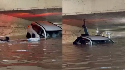 Car Submerged In Flooded Thane Underpass Amid Rainfall, Locals Swim To ...