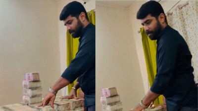 Video Shows Aide Of YSRCP Leader Counting Cash Amid Andhra Liquor Scam ...
