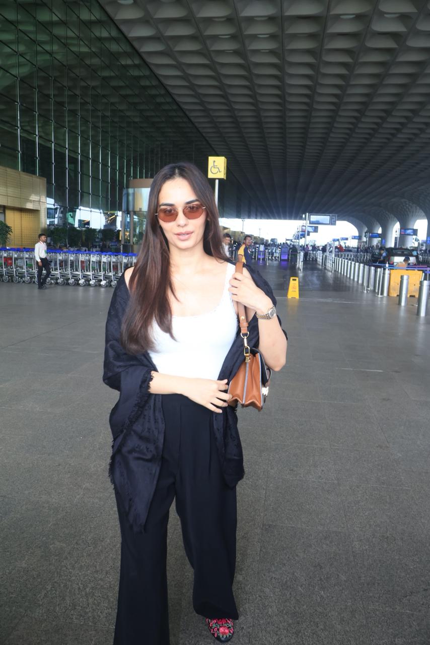 Manushi Chhillar Seen at Mumbai Airport, Upcoming Film Tehran with John ...