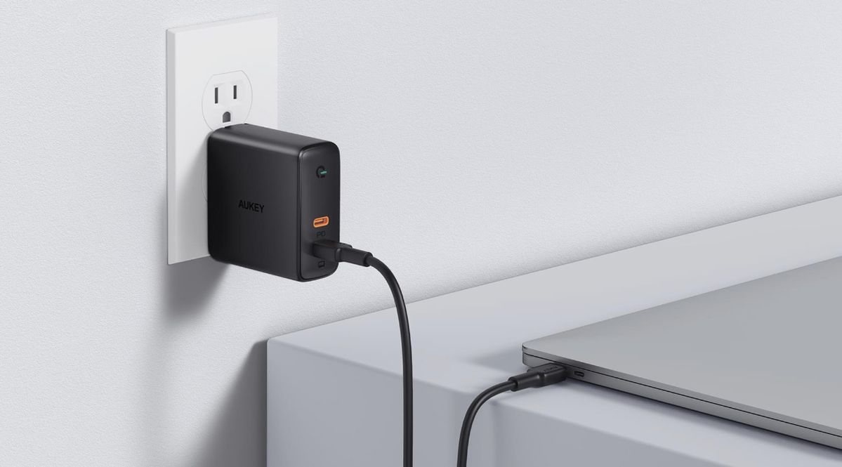 What Is That Cylinder On Your Laptop Charger? Here's Why It Matters