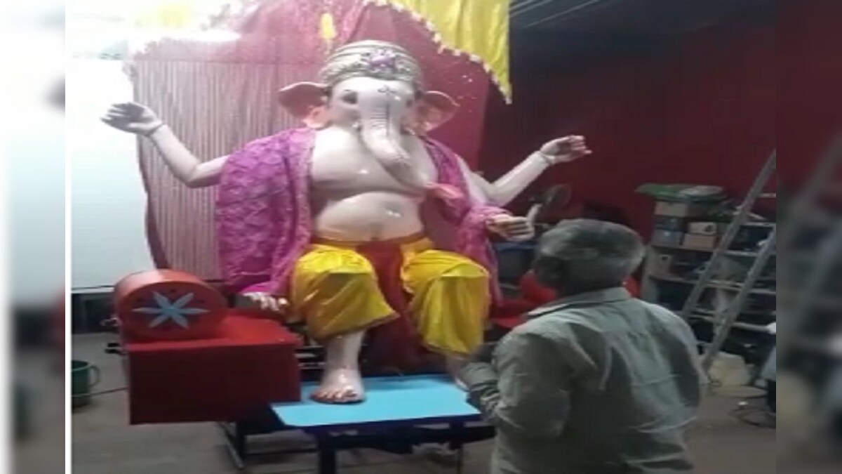 Satara ganpati bappa standing up and gives blessing after charan ...