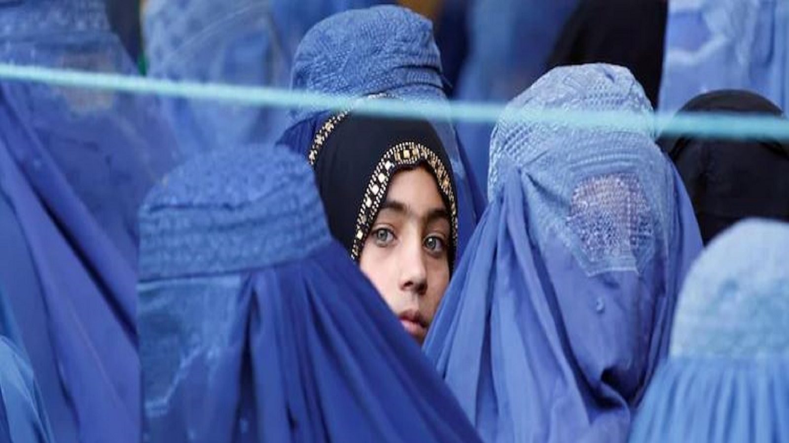 Taliban announce women must cover faces in public say blue burqa is ...