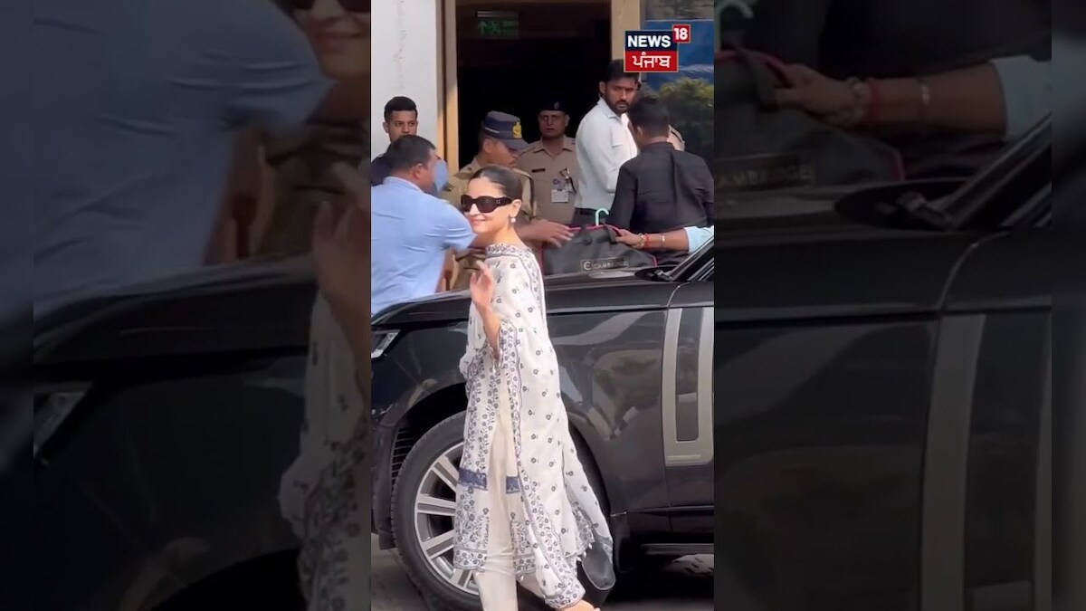 Alia Bhatt's Effortless Elegance Takes Flight In A Pristine White Suit At the Airport | N18S