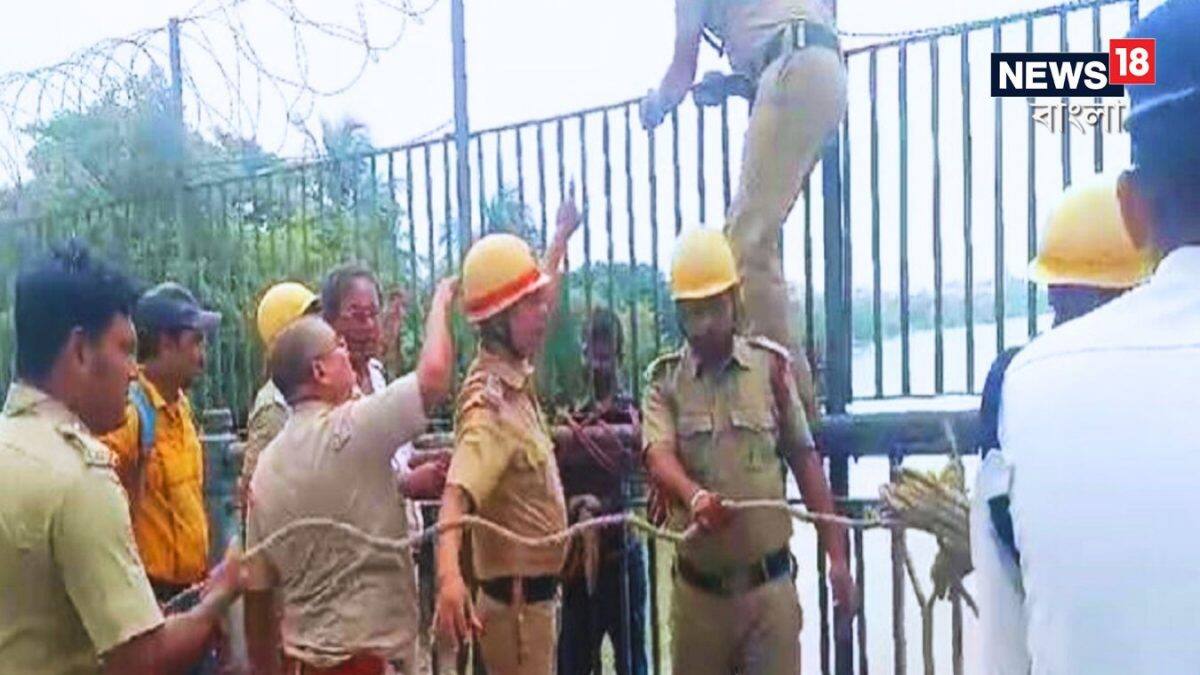 Howrah bridge: রেলিং টপকে ঝুলছেন যুবক, নীচে গঙ্গা! ভরদুপুরে হাওড়া ...