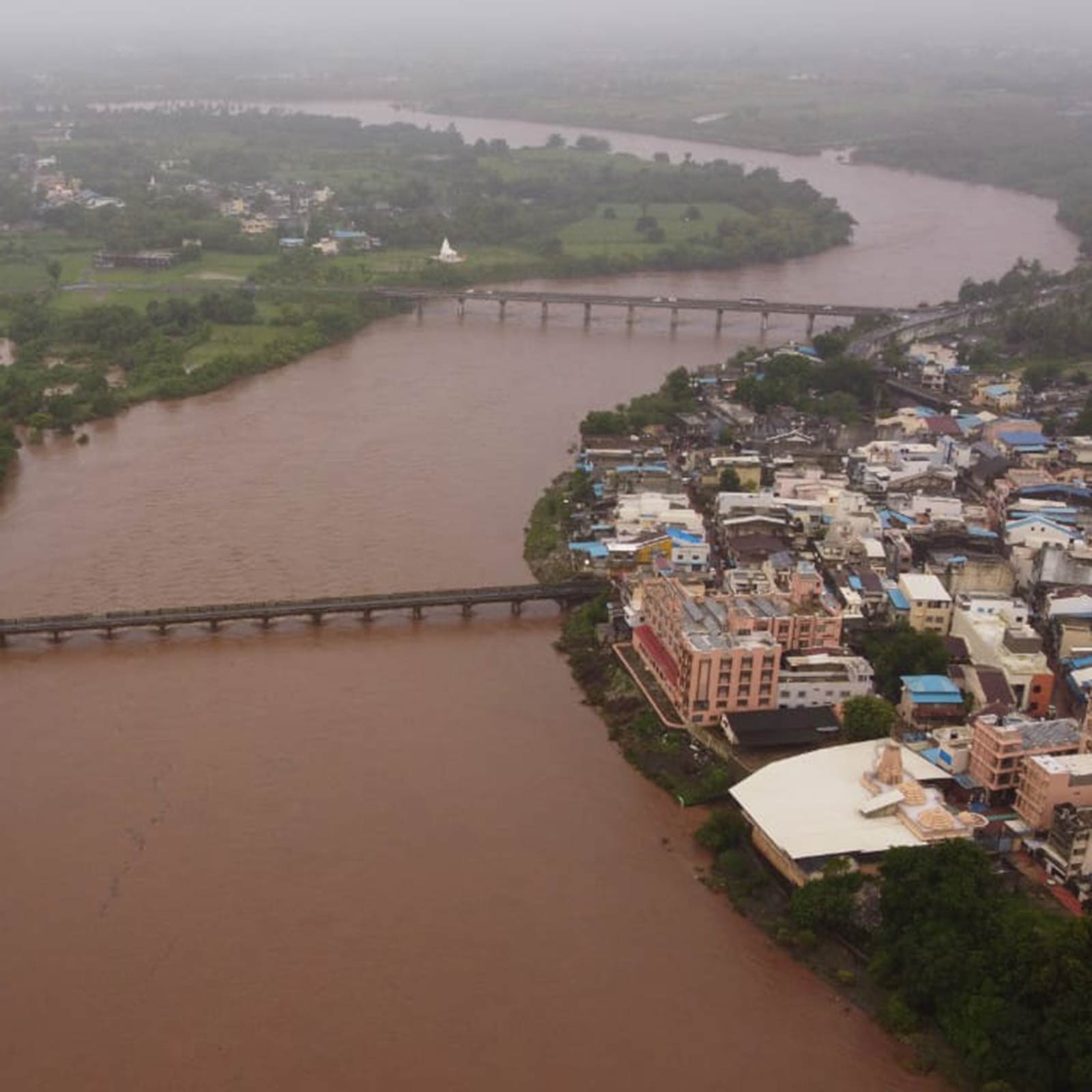 પૂર્ણા નદીના પાણી સુરતના અનેક વિસ્તારોમાં ફરી વળ્યાં, જુઓ આકાશી નજારો ...