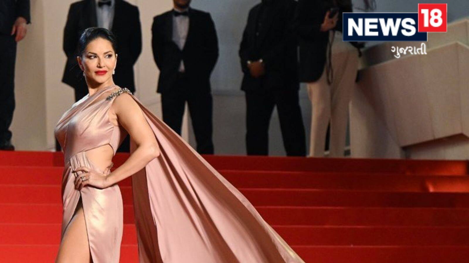 Sunny Leone Cannes 2023 look thigh high slit gown walked in red carpet - થાઈ હાઈ સ્લિચ ગાઉનમાં ...