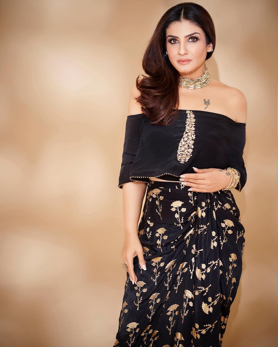 bollywood actress raveena tandon bold photoshoot as she shows cleavage ...