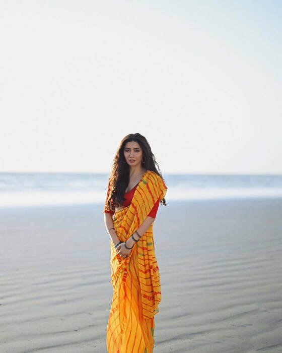 Pakistani actress mahira khan shows off her beauty in yellow saree and ...